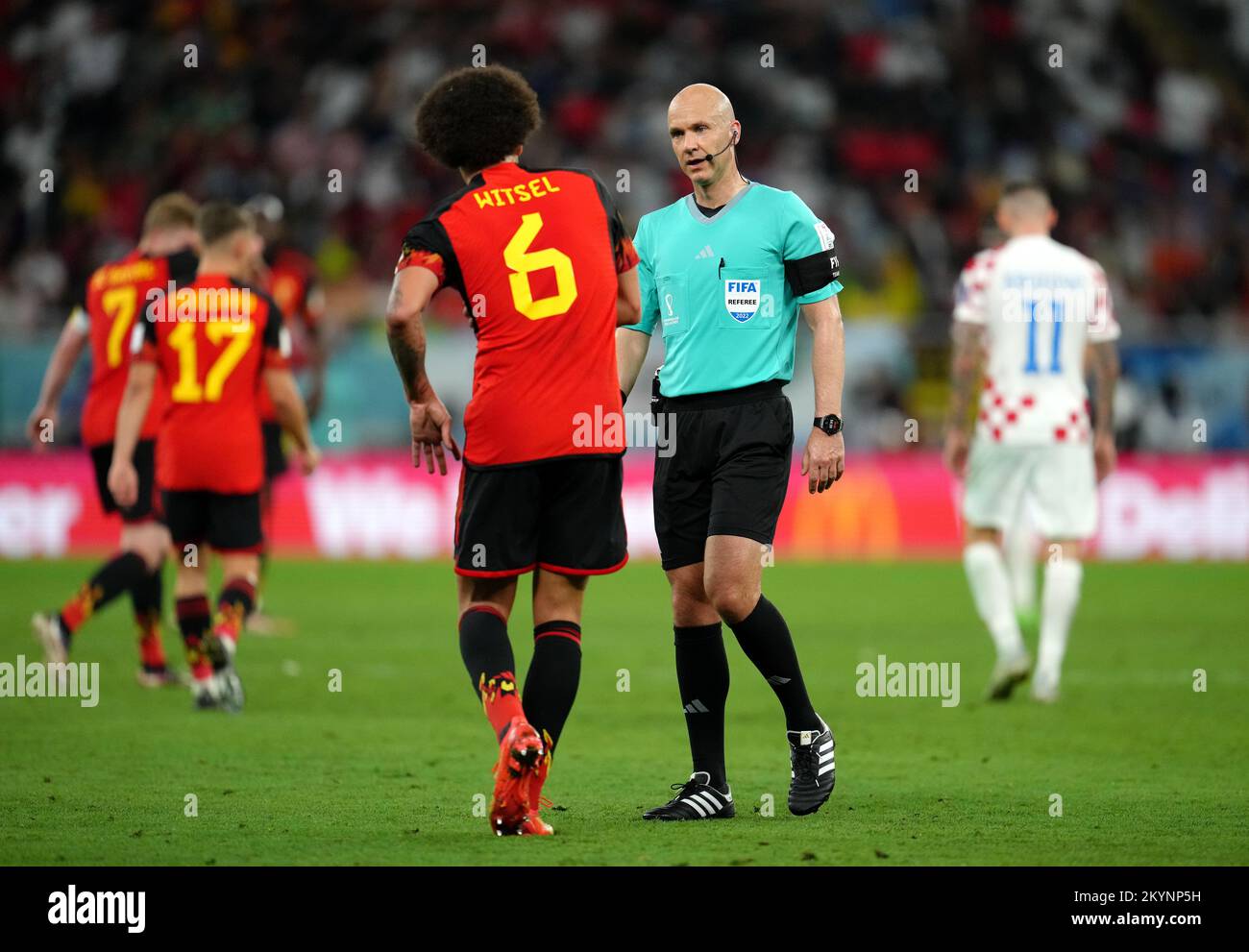 Referee Anthony Taylor speaks with Belgium's Axel Witsel during the ...