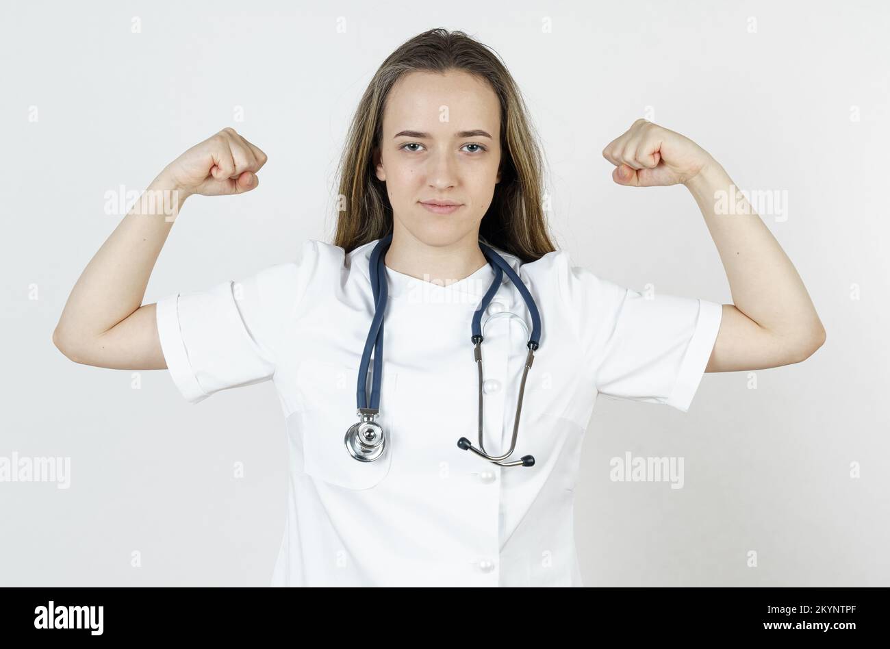 Medicine and health concept. The doctor shows his muscles ...