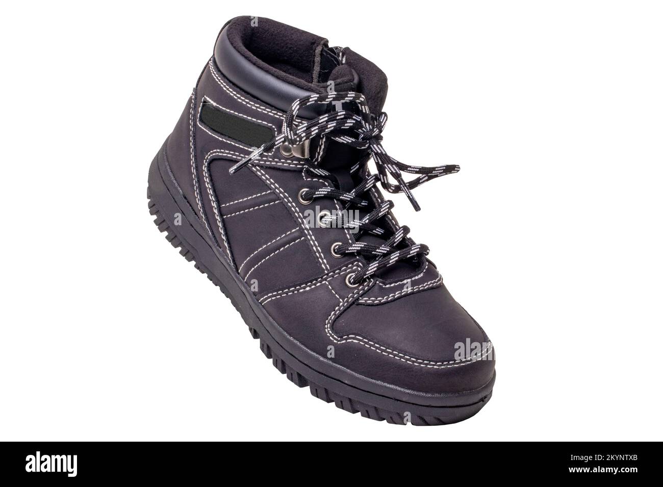 Winter boots. Close-up of a single elegant black leather winter boots ...