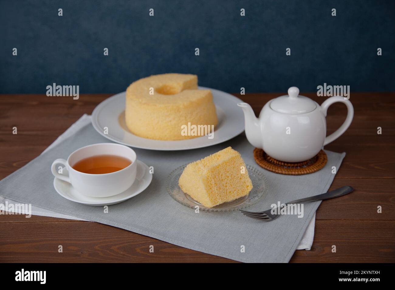 plain chiffon cake hot tea set isolated on white background Stock Photo ...