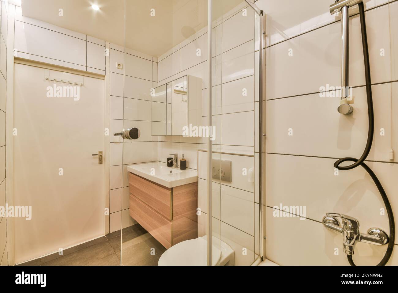 Modern home interior design of white bathroom with open bathtub and ...