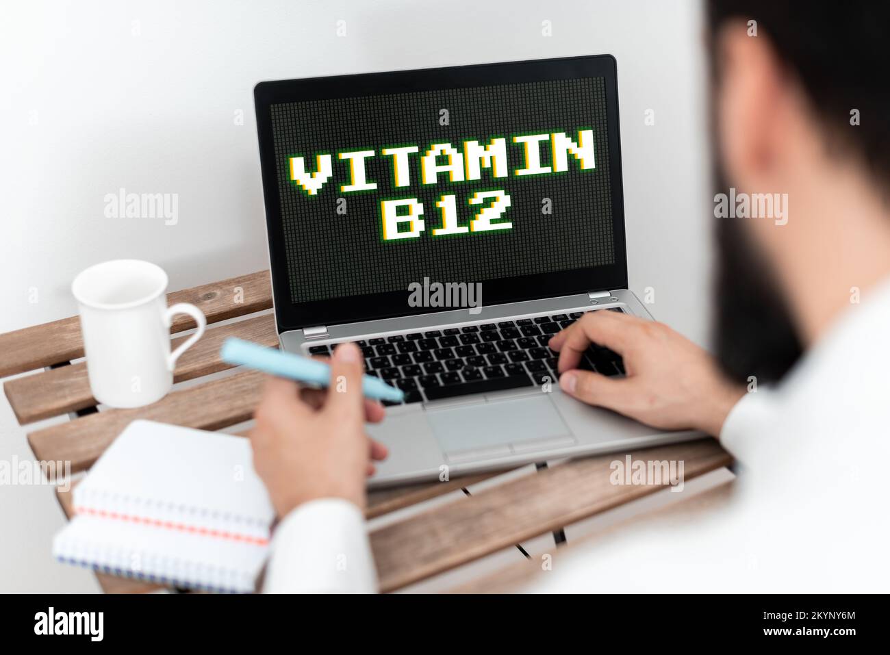 Hand writing sign Vitamin B12. Concept meaning Group of substances ...