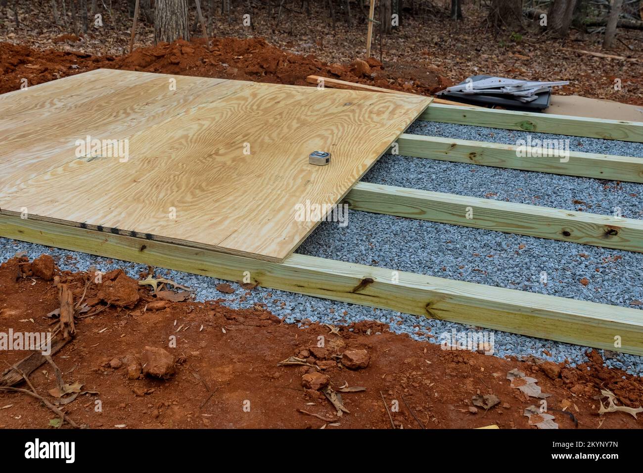 Construction of wood deck foundation for construction small shed in ...