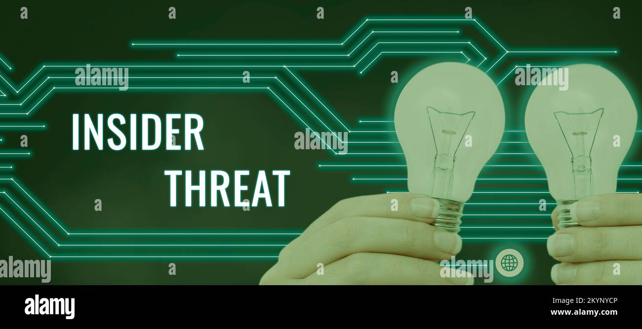 Hand writing sign Insider Threat. Business idea security threat that ...