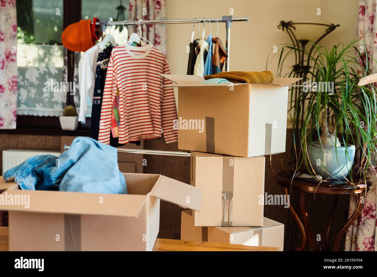 Pre owned clothes resale or donation Stock Photo - Alamy