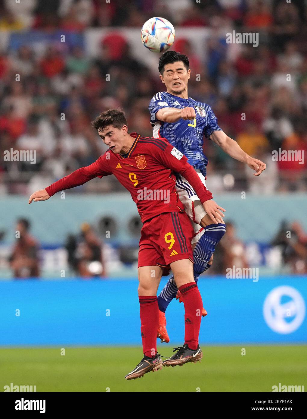 Spain's Gavi (left) and Japan's Shogo Taniguchi battle for the ball ...