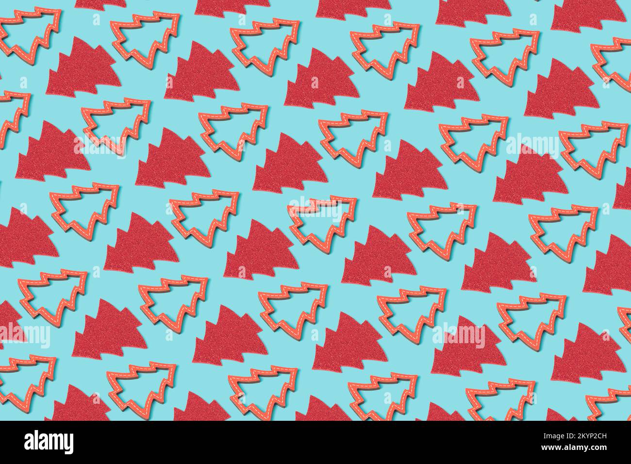 Christmas tree red ornaments pattern on a pastel blue background ...