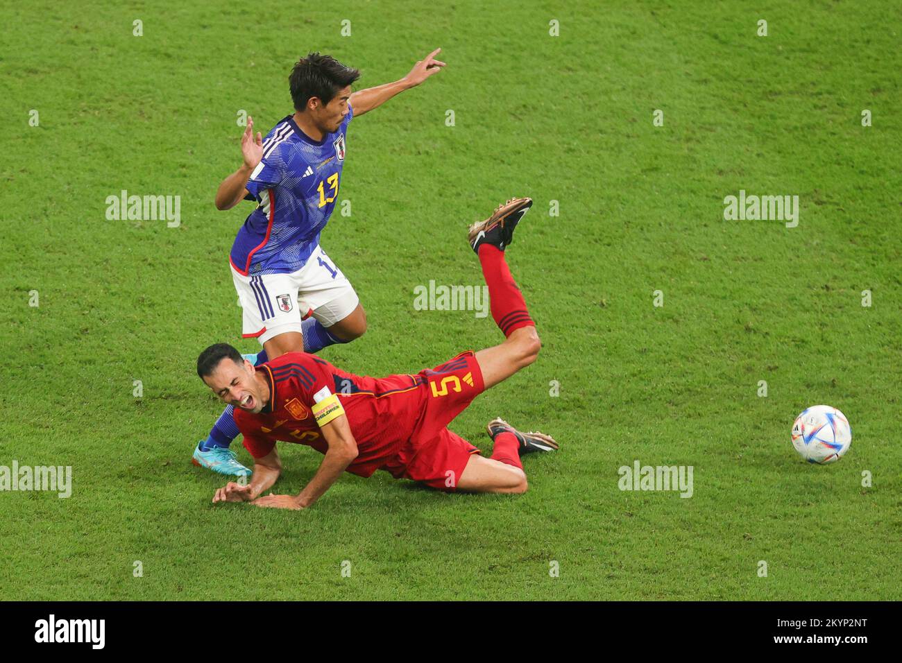 Doha, Qatar. 01st Dec, 2022. Sergio Busquets of Spain is fouled by ...