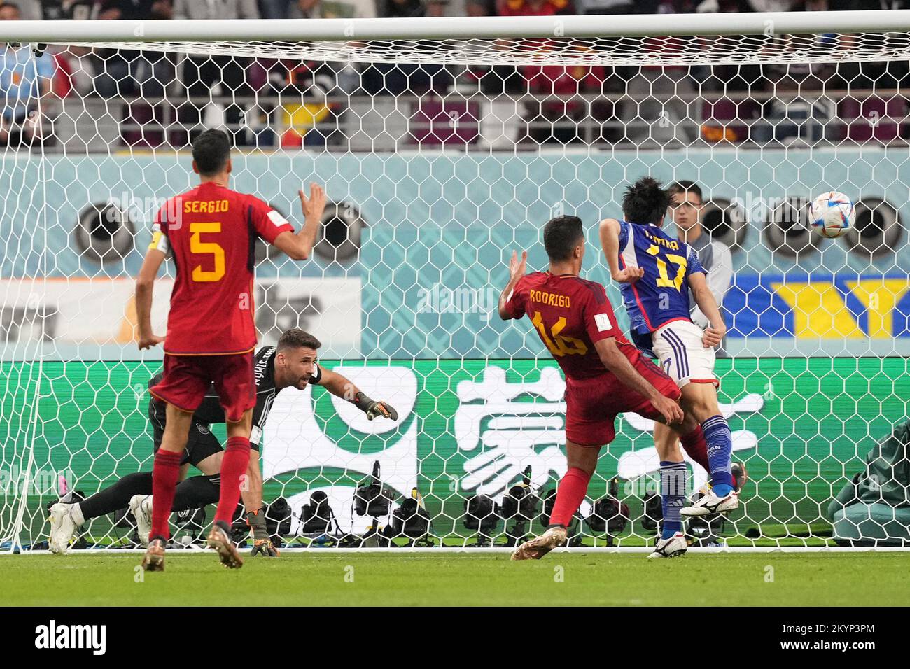 Japan's Ao Tanaka (right) scores their side's second goal of the game ...