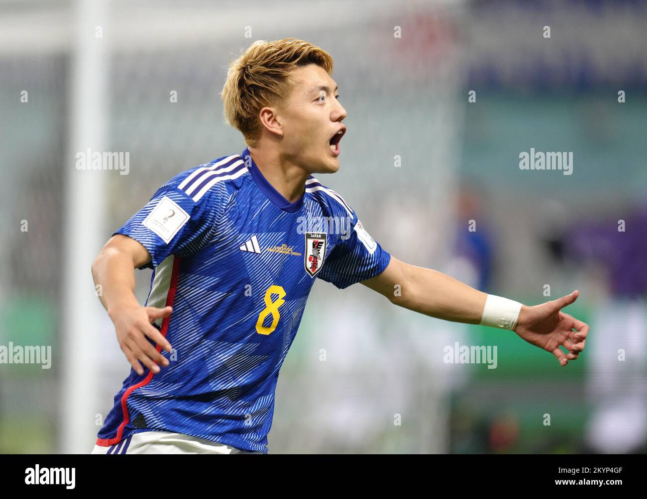 Japan's Ritsu Doan celebrates his team's second goal during the FIFA ...
