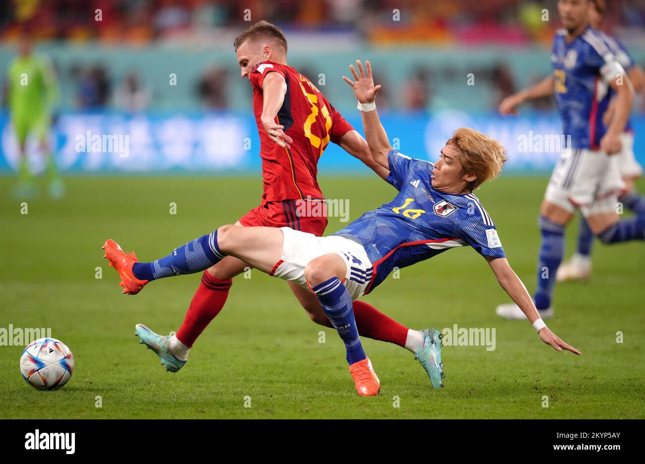 Spain's Dani Olmo (left) and Japan's Junya Ito battle for the ball ...