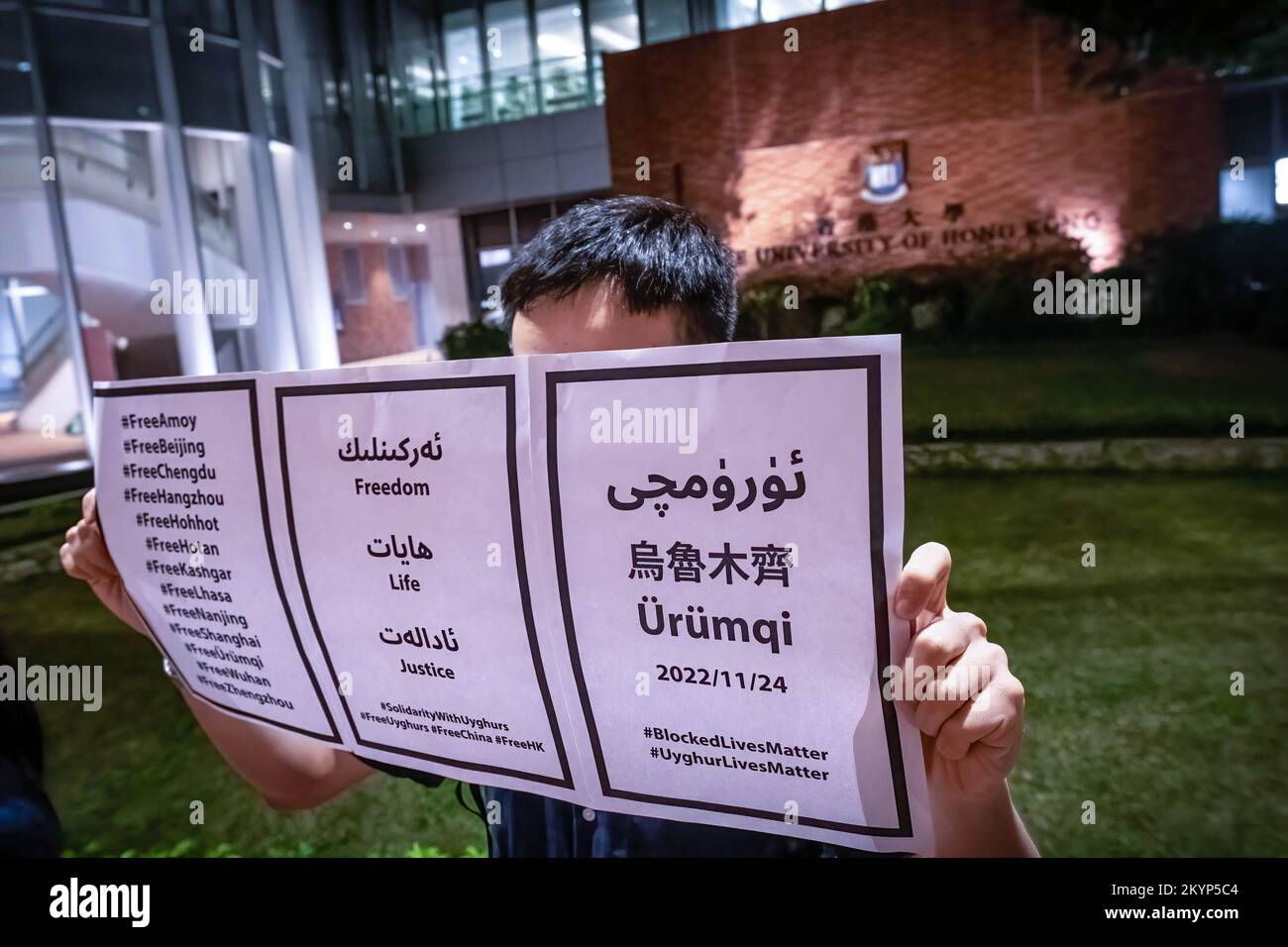 Hong Kong, China. 29th Nov, 2022. A protester holds a placard ...