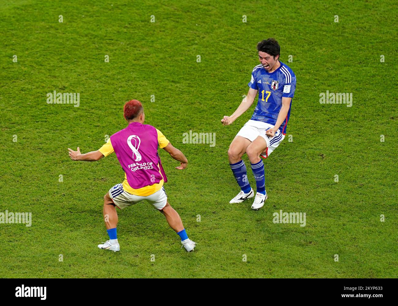 Japan's Ao Tanaka (right) celebrates after his goal stands following a ...