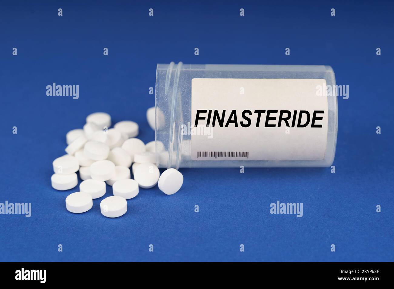 The concept of pharmacology and health. On a blue surface are pills and ...