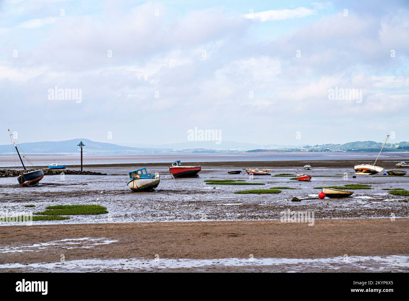 Small boats in Morecambe Bay at low tide Stock Photo - Alamy