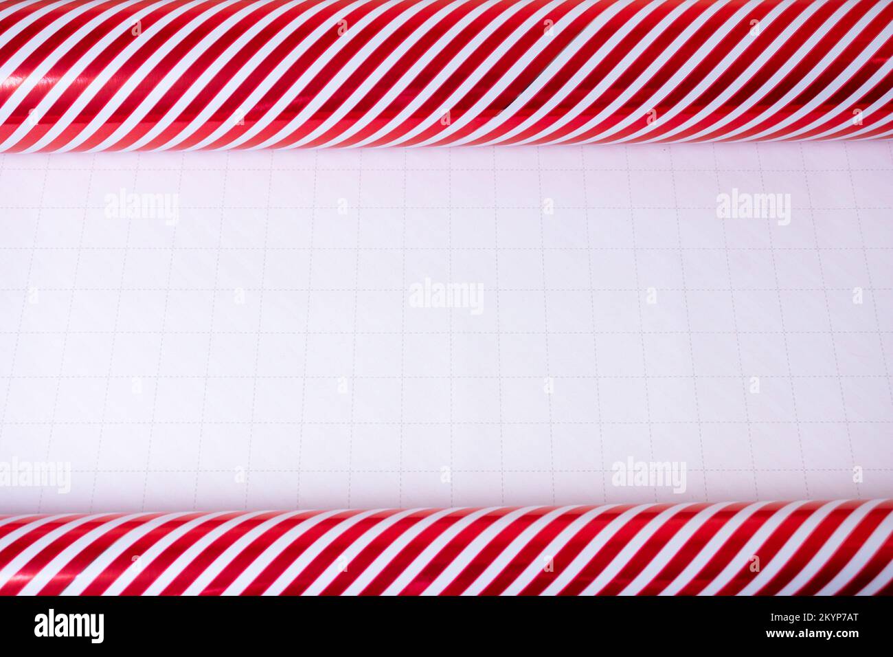 Gift wrapping paper with red and white stripes and dotted copy space ...