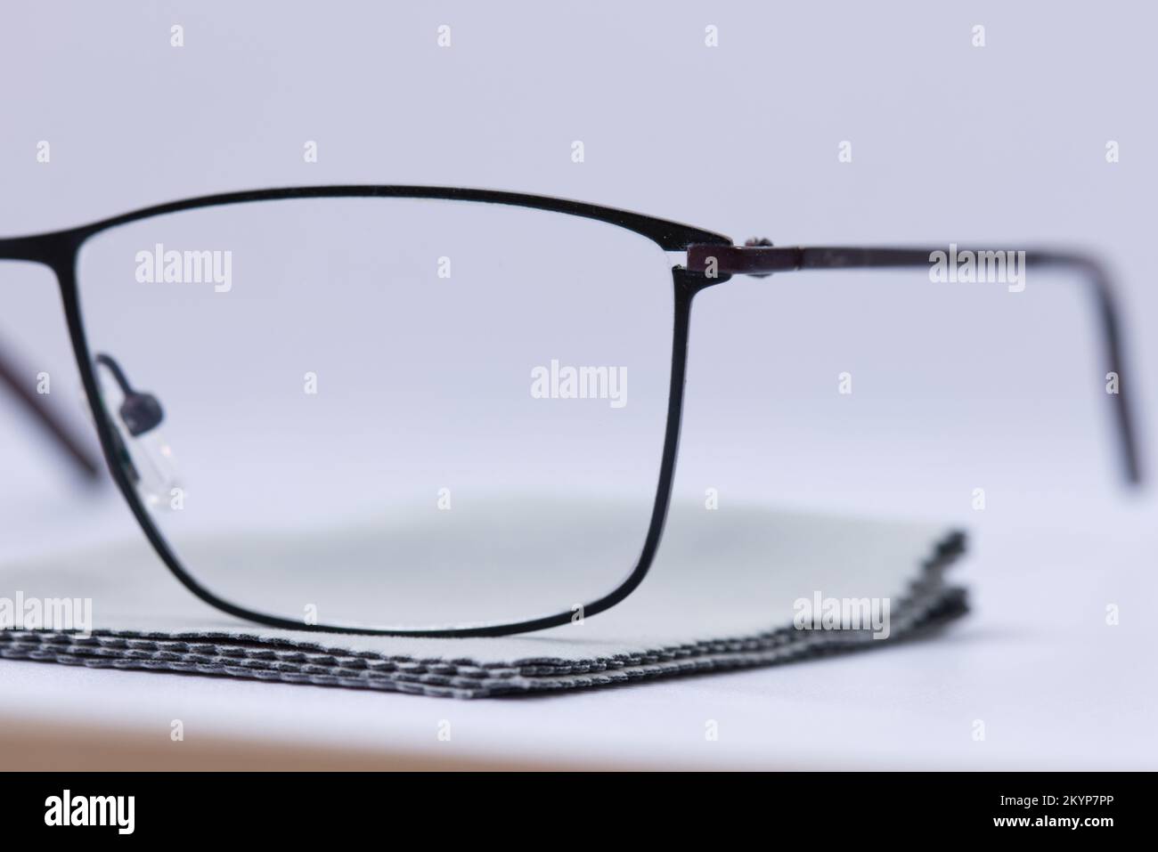 Close up. Concept for cleaning glasses by microfiber cloth for cleaning ...