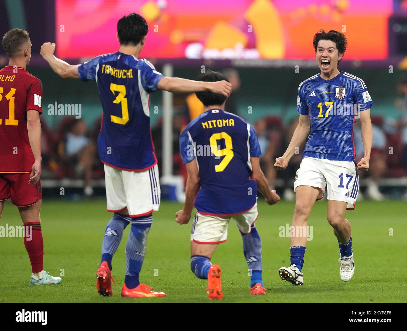 Japan's Shogo Taniguchi, Kaoru Mitoma and Ao Tanaka celebrate following ...