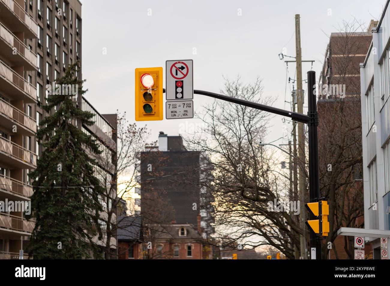 Traffic light in street with buildings in downtown district of Ottawa ...