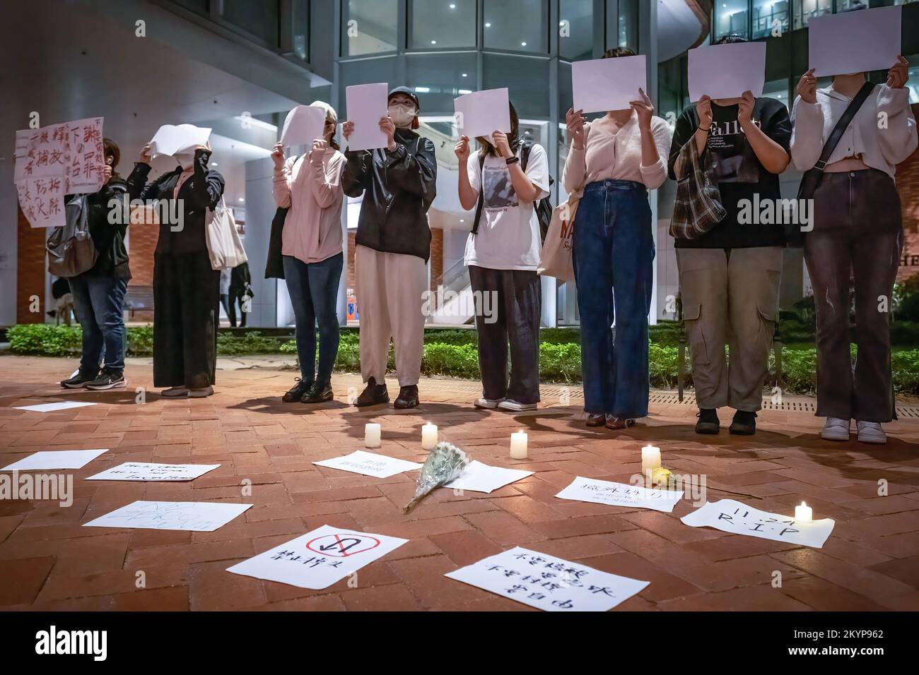Hong Kong, China. 29th Nov, 2022. Protesters seen holding blank A4 ...