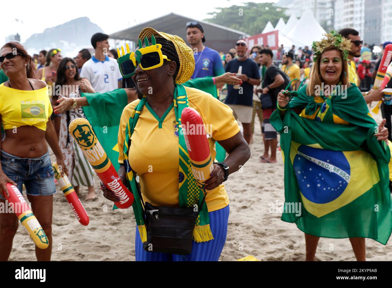 Brazilian fans gather at street party to support national soccer team ...