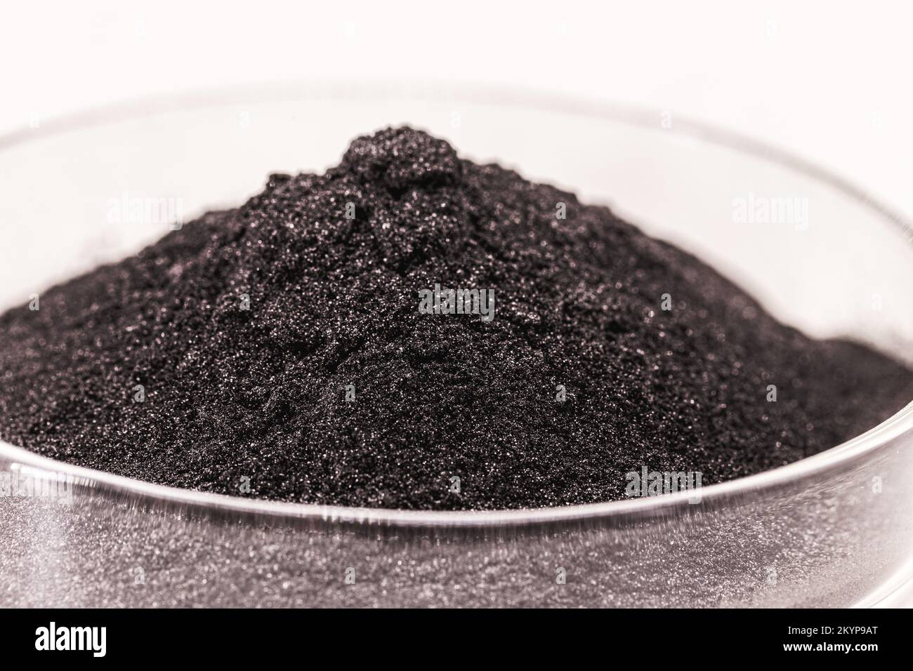 black pigment, powder for industrial or cosmetic use, isolated white ...