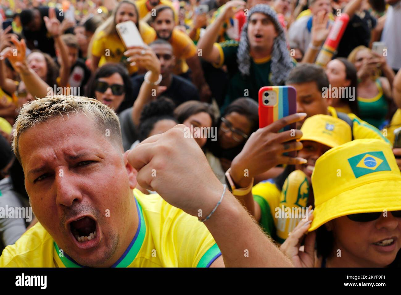 Brazilian fans celebrating goal score to support national soccer team ...