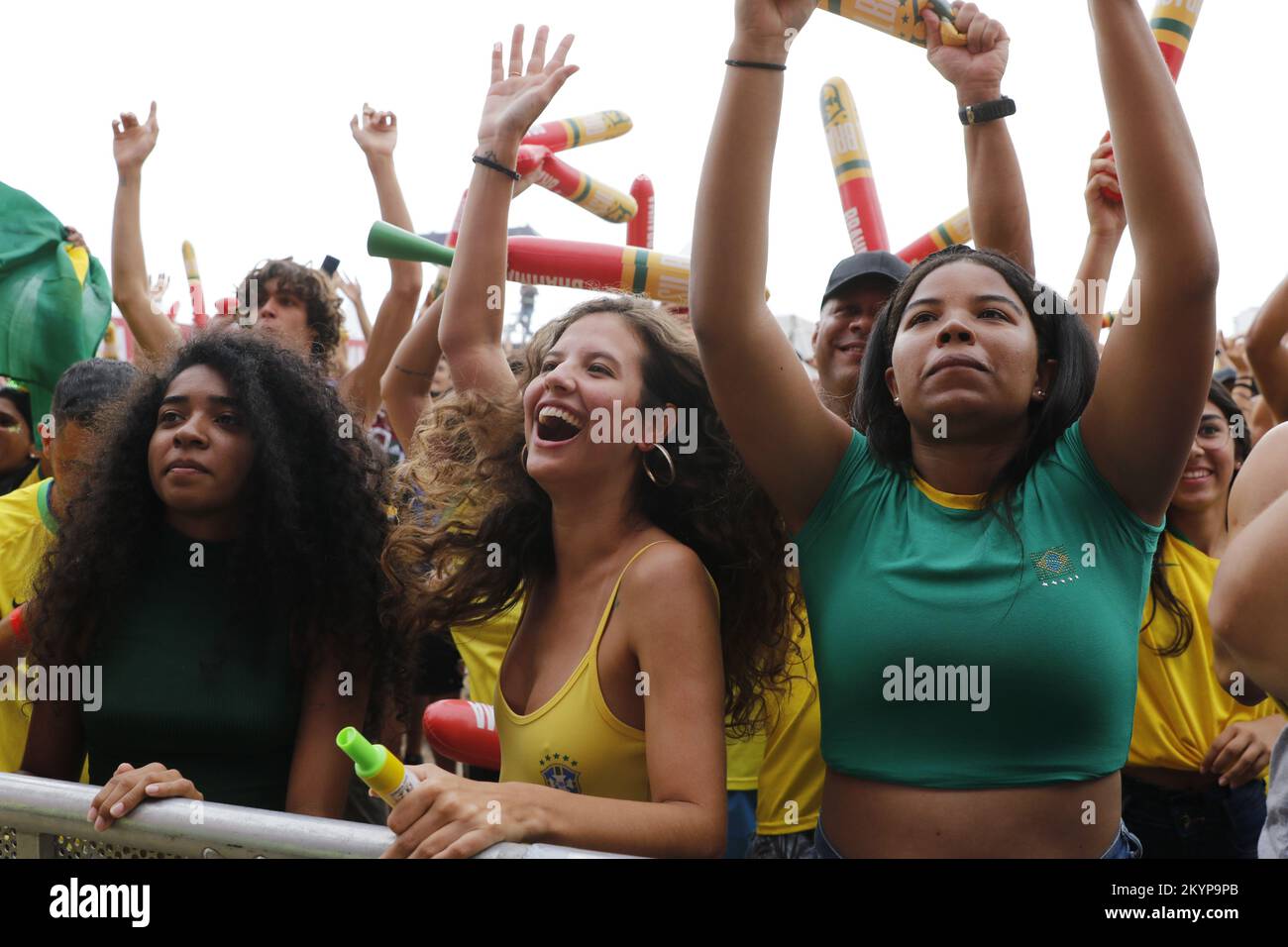 Brazilian women fans cheering at street party to support national ...