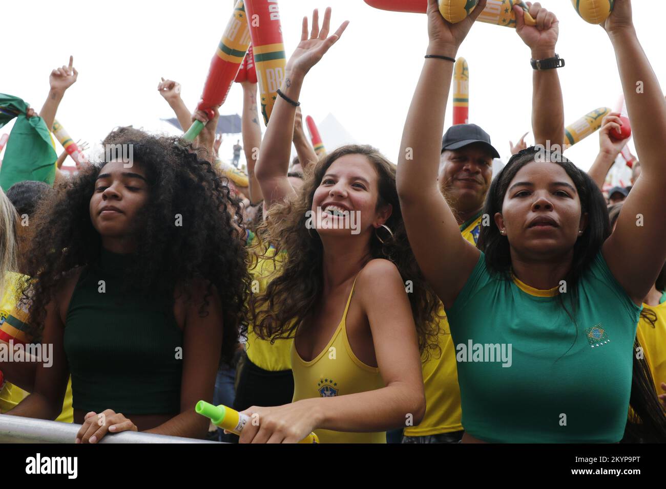 Brazilian women fans cheering at street party to support national ...