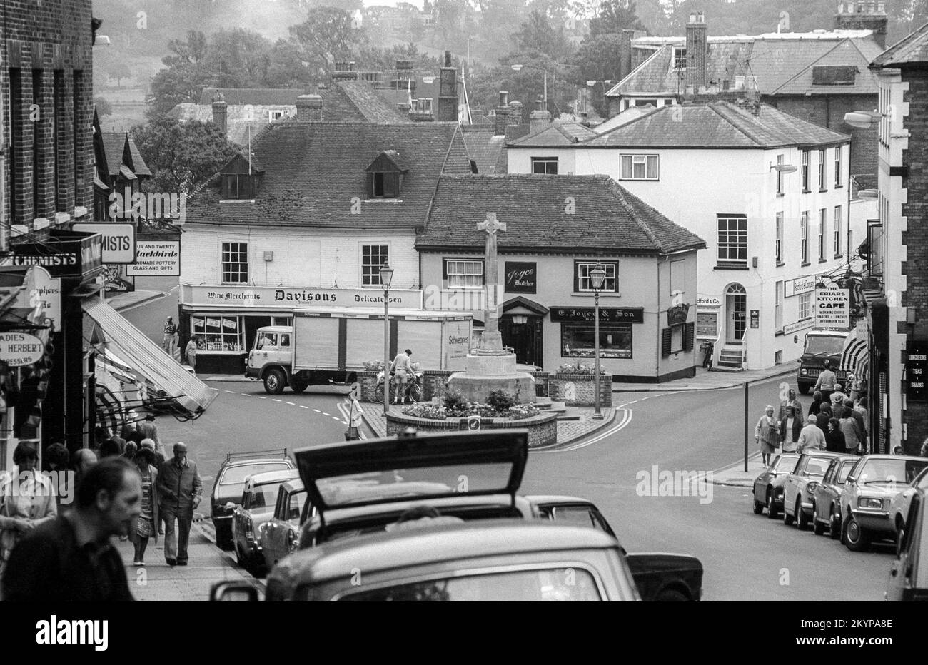 1976 black and white archive photograph of the High Street and war memorial in Arundel, West ...