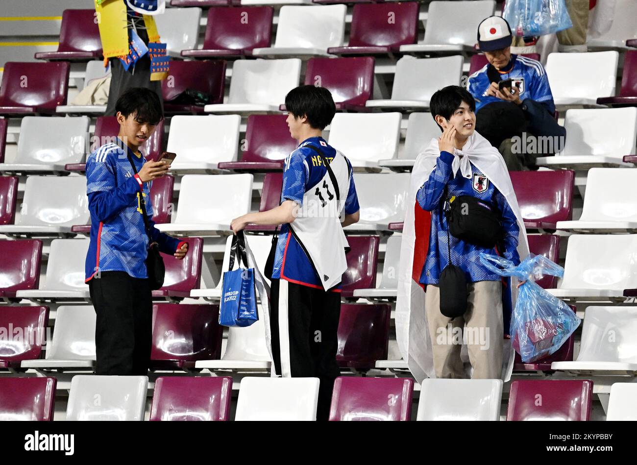 Japan fans clean up after the match hi-res stock photography and images ...