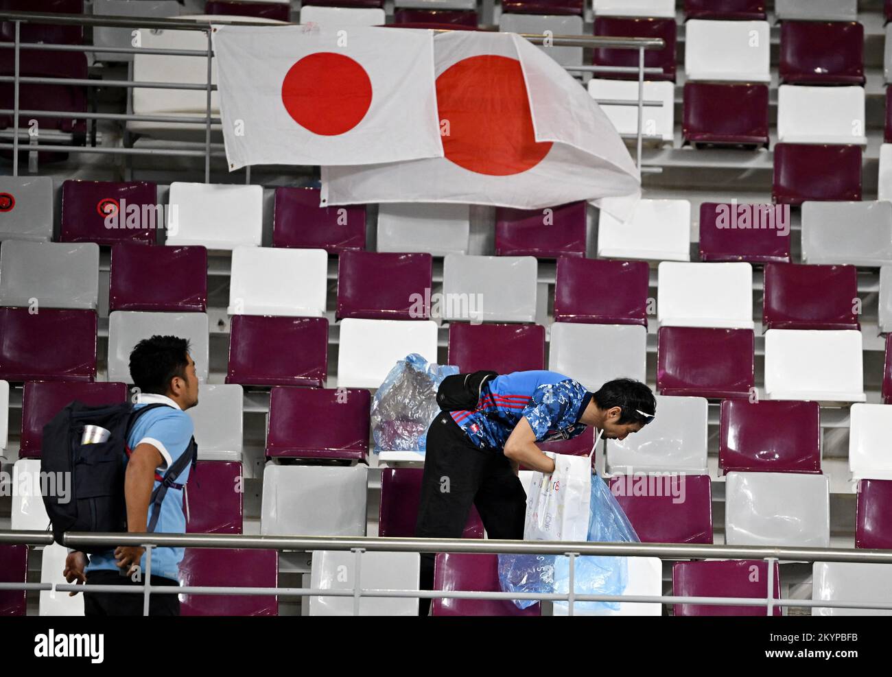 Japan fans clean up after the match hi-res stock photography and images ...