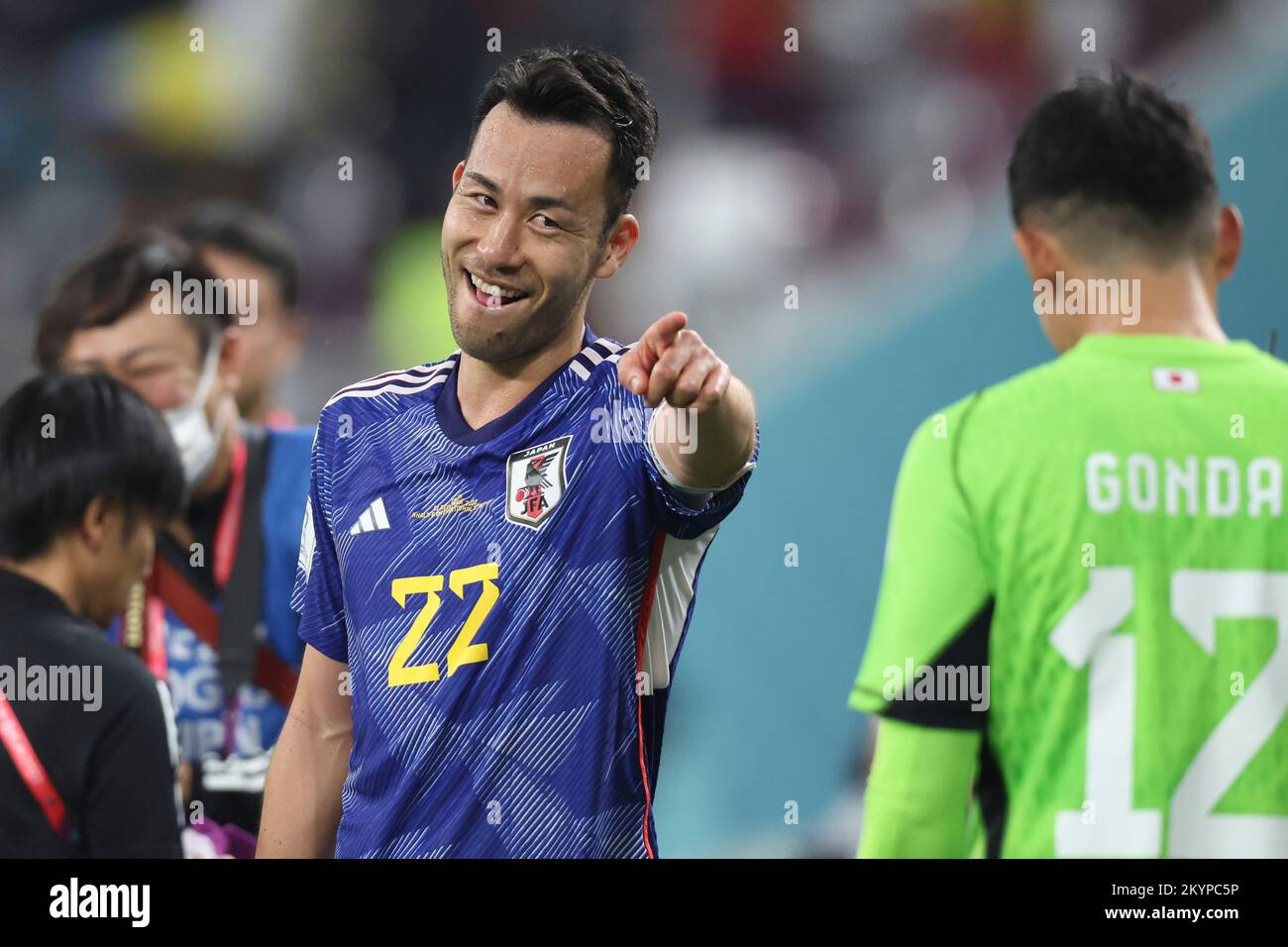 Doha, Qatar. 1st Dec, 2022. Yoshida Maya (L) of Japan celebrates after ...