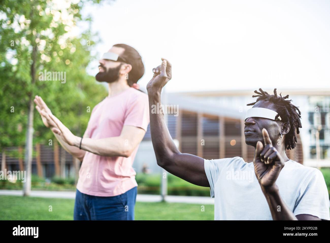 Multicultural friends using futuristic augmented reality glasses on a ...