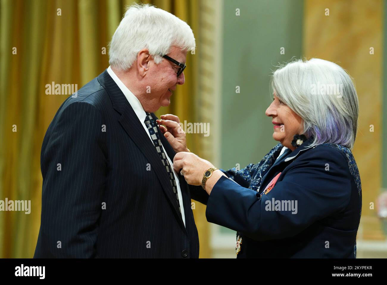 Governor General Mary Simon invests George Brookman as a member of the Order of Canada during a ...