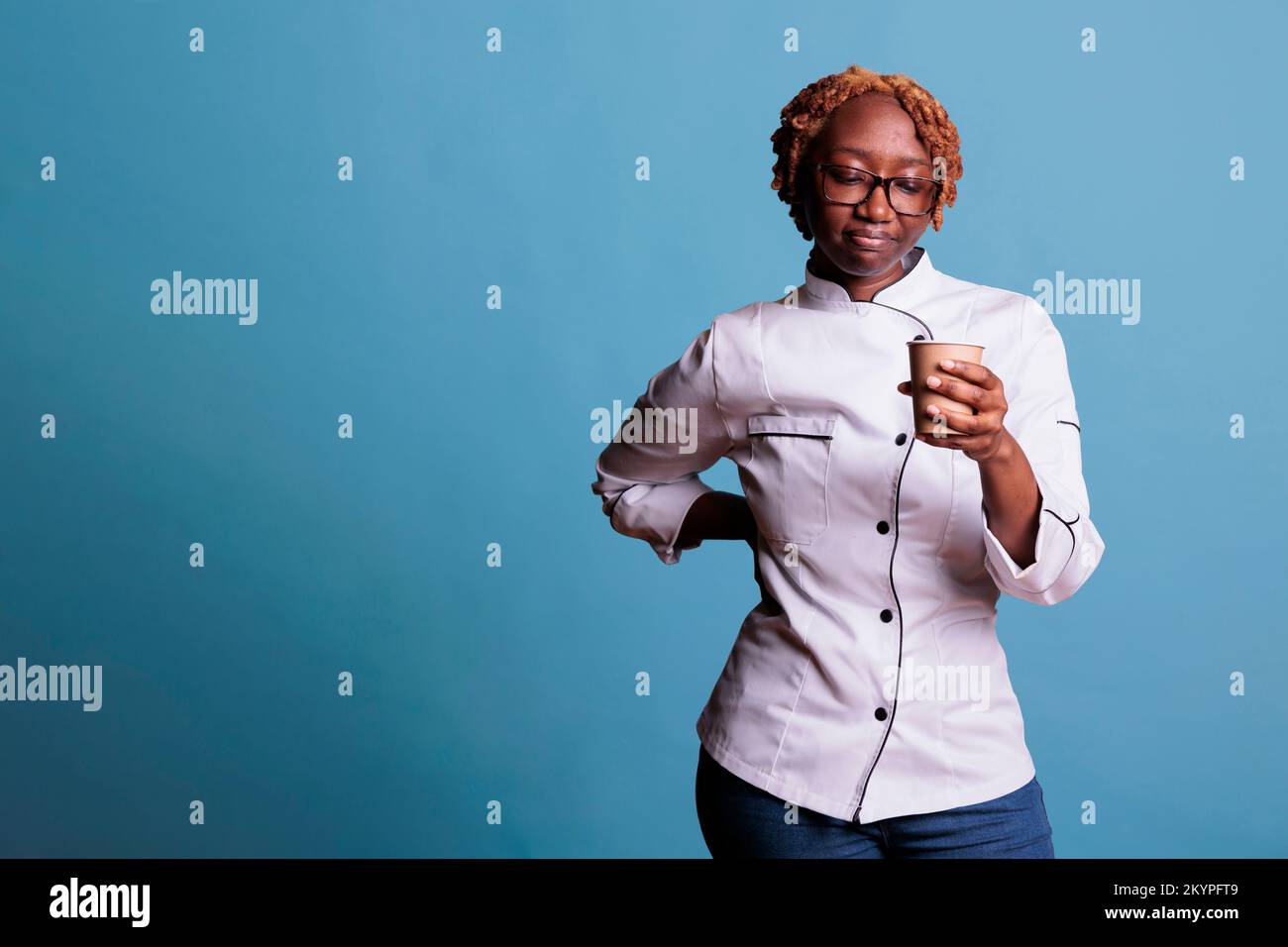 African american cook pensive with sad expression looking at disposable ...