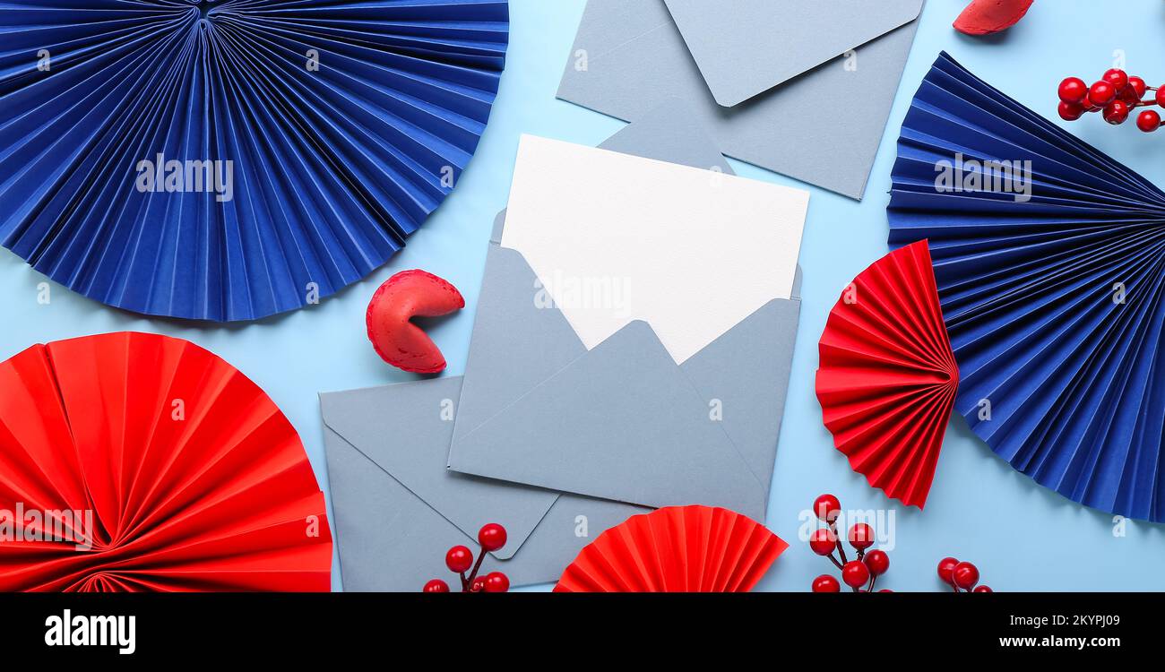 Envelopes with blank card and Chinese symbols on blue background. New ...