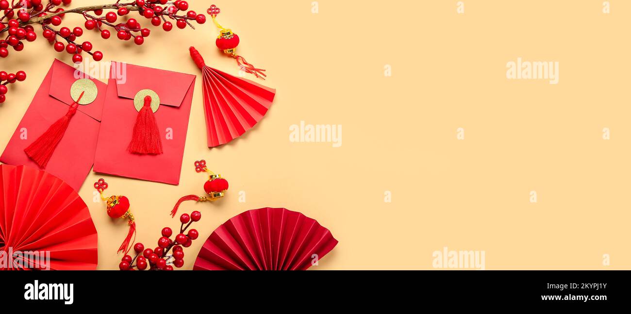 Red envelopes with Chinese symbols on beige background with space for ...
