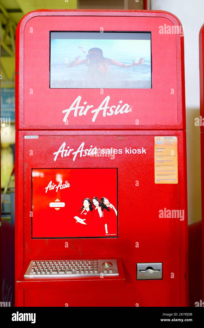 KUALA LUMPUR, MALAYSIA - MAY 02, 2014: AirAsia self check-in kiosks ...