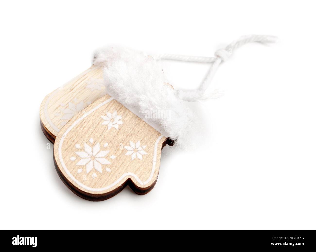 Wooden mitten toys on white background Stock Photo - Alamy