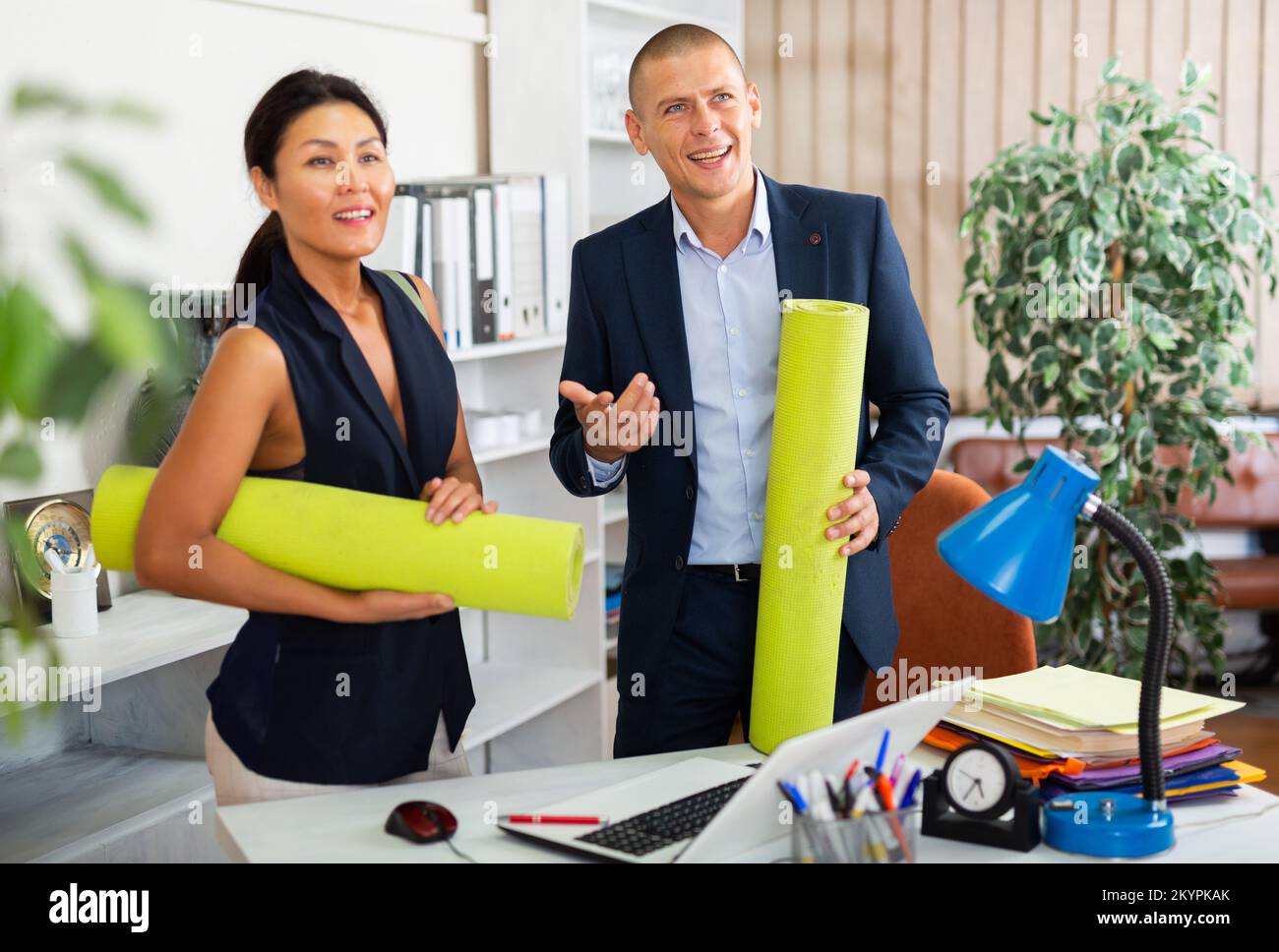 Business colleagues going to training after working day Stock Photo - Alamy
