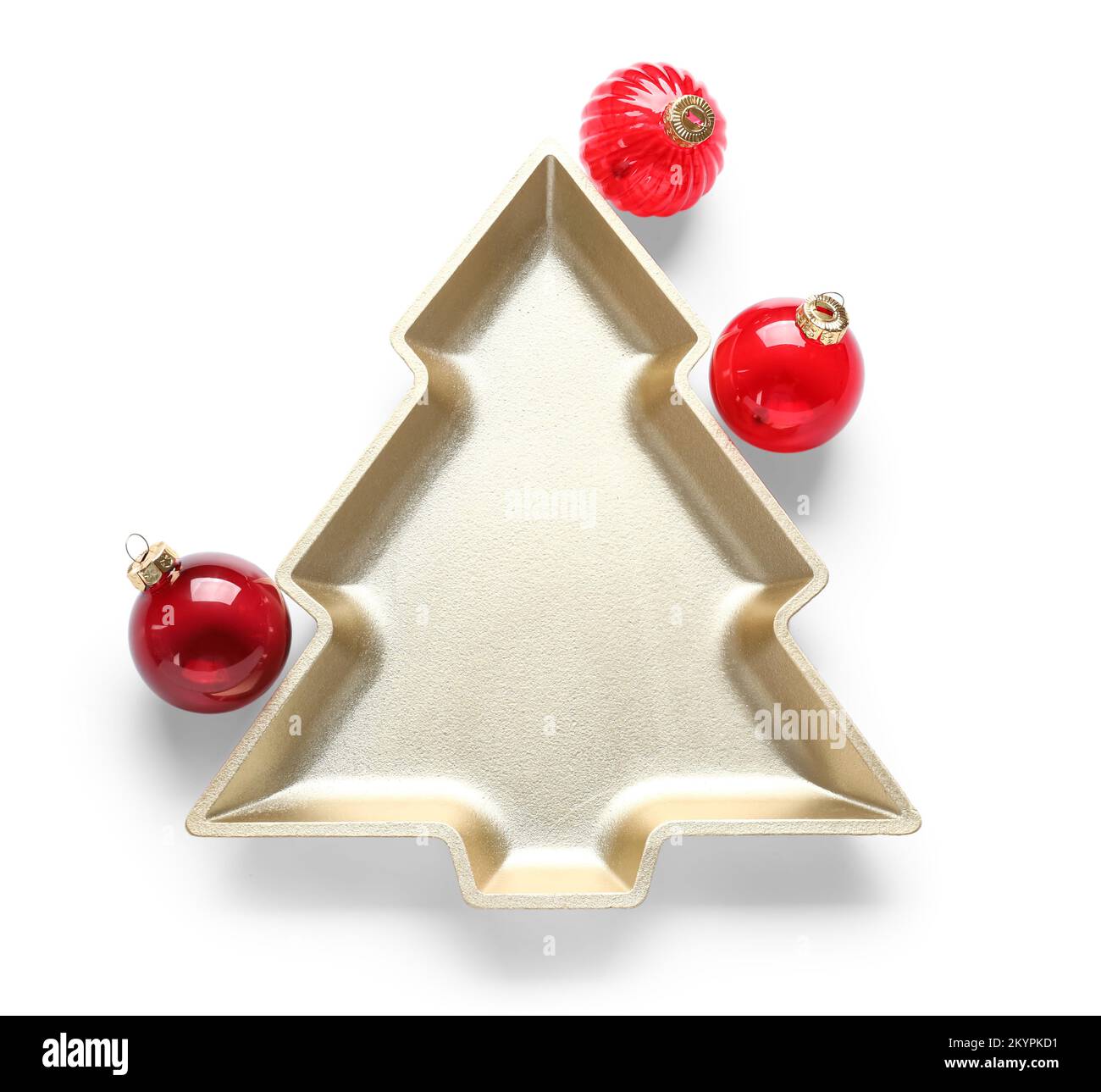 Plate in shape of Christmas tree and balls on white background Stock ...