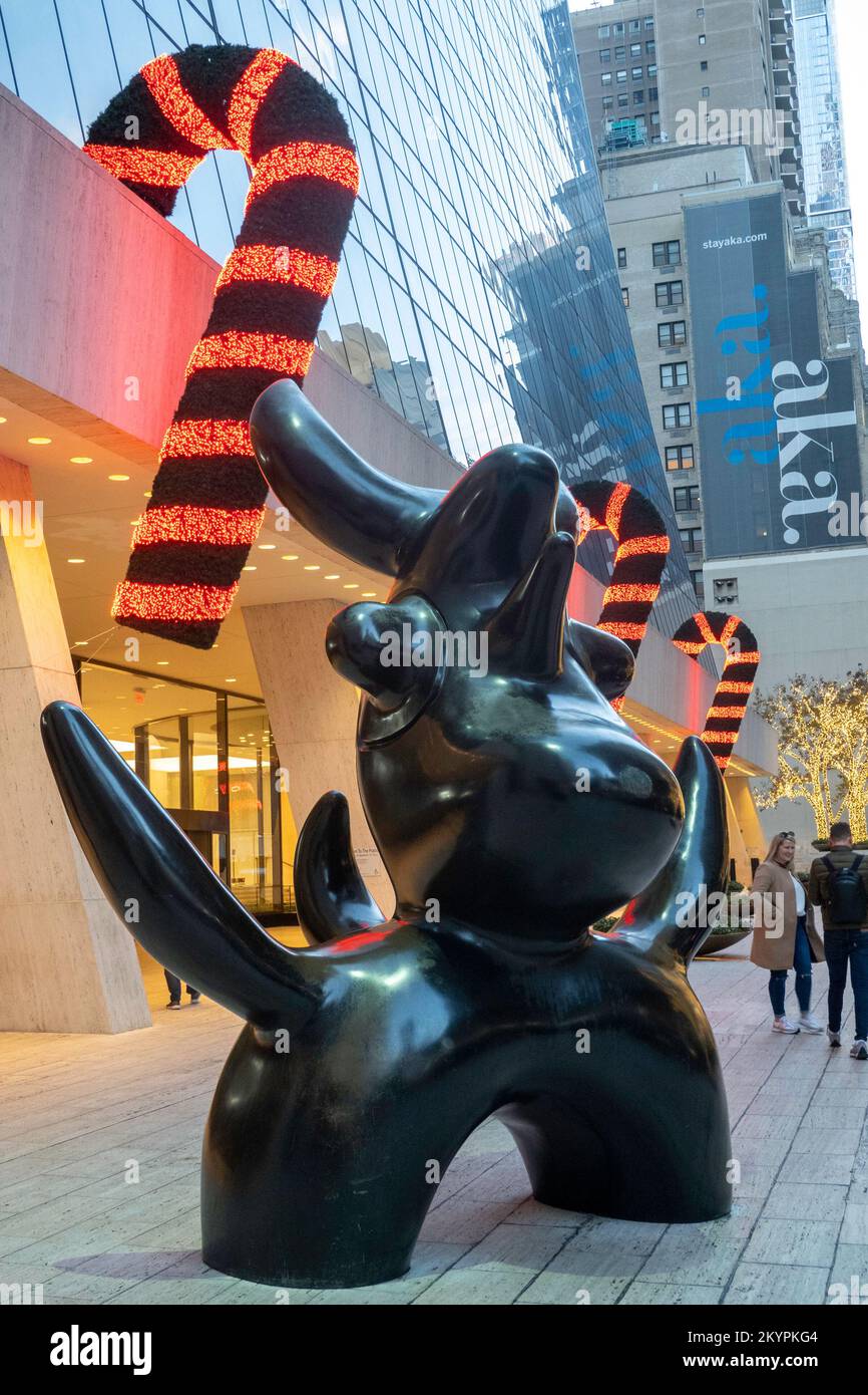 Joan Miro's Moonbird Sculpture with the holiday decorated Solow ...