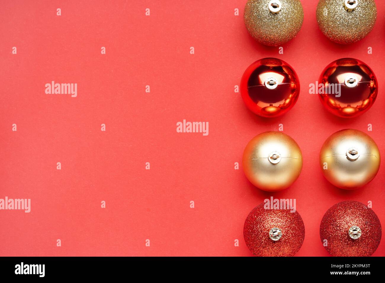 Shiny Christmas balls on red background Stock Photo - Alamy