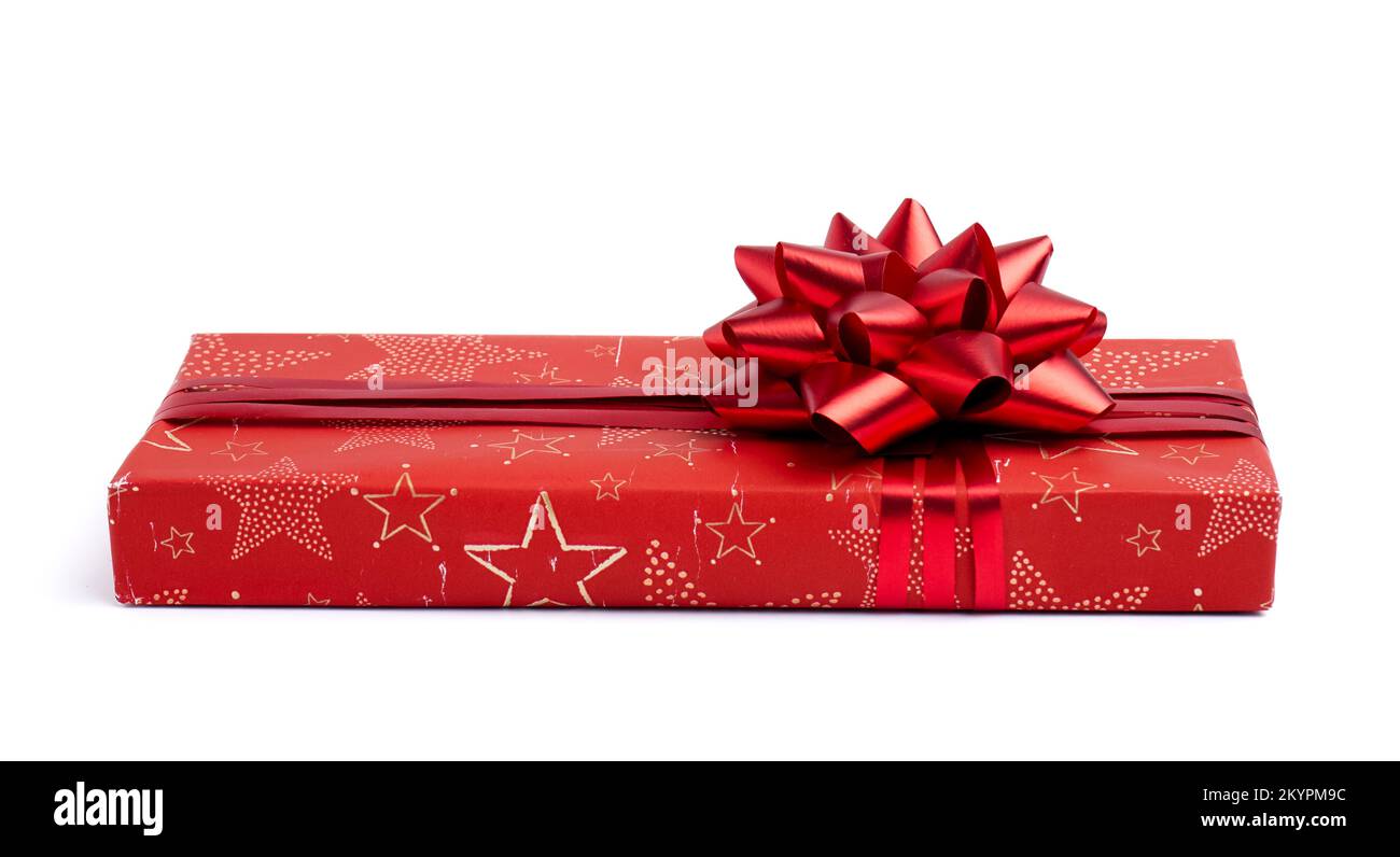 Christmas gift box with red bow on white background Stock Photo - Alamy