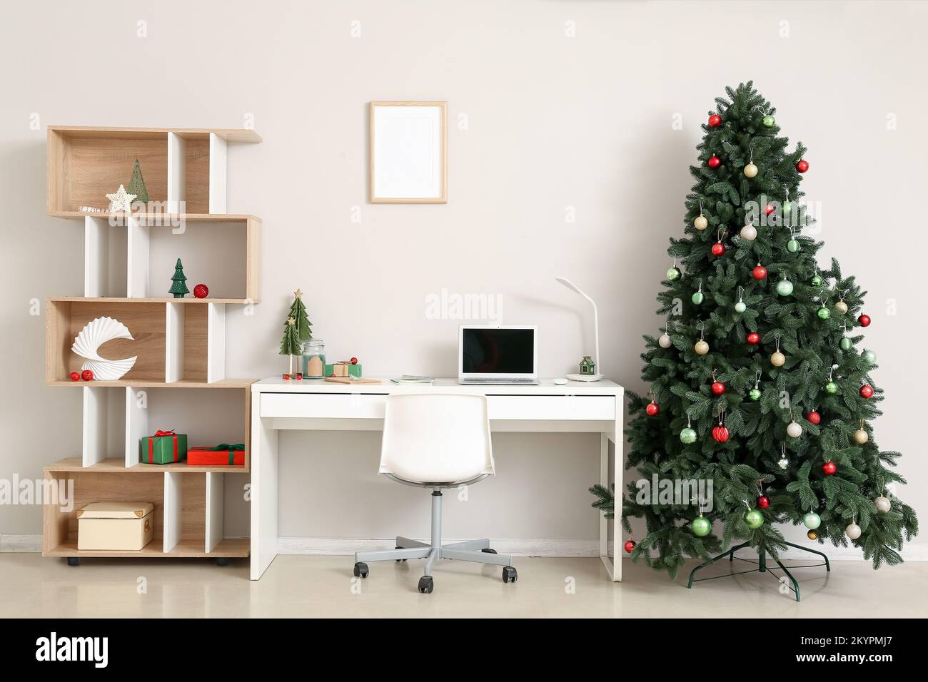 Interior of office with workplace, Christmas trees and presents Stock ...