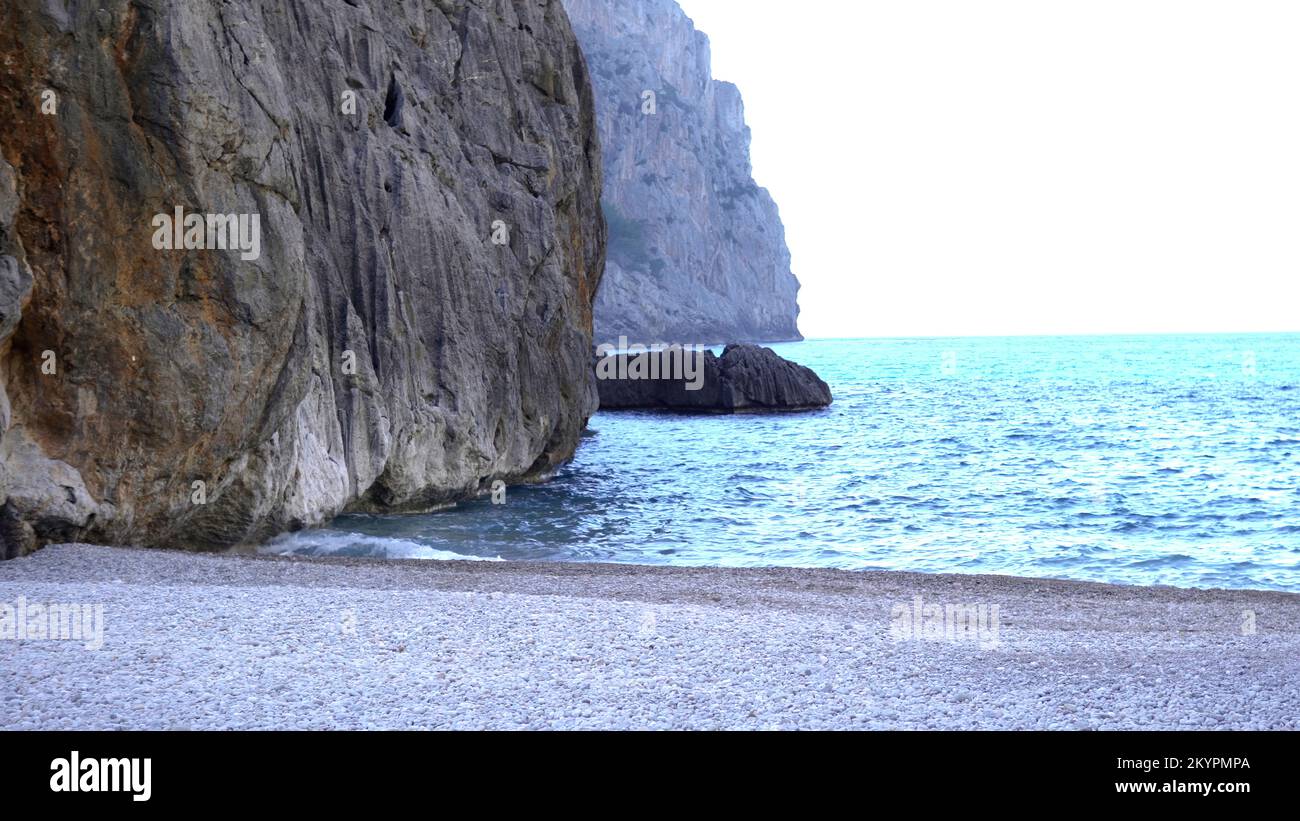 View of coastal cliffs with blue sea. Art. Perfect summer area with ...