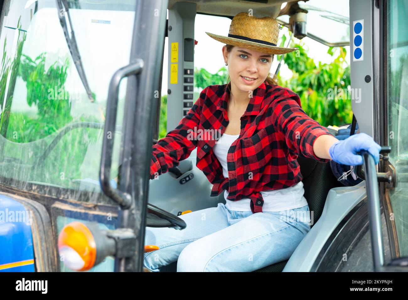 Female agricultural worker tractor hi-res stock photography and images ...