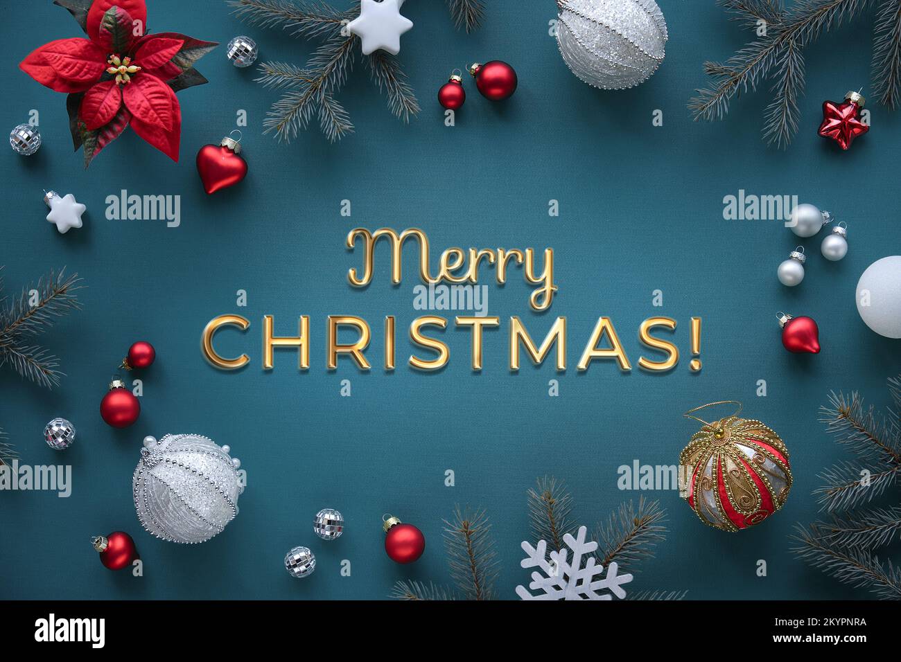 Text Merry Christmas. Festive Xmas decorations on dark turquoise ...