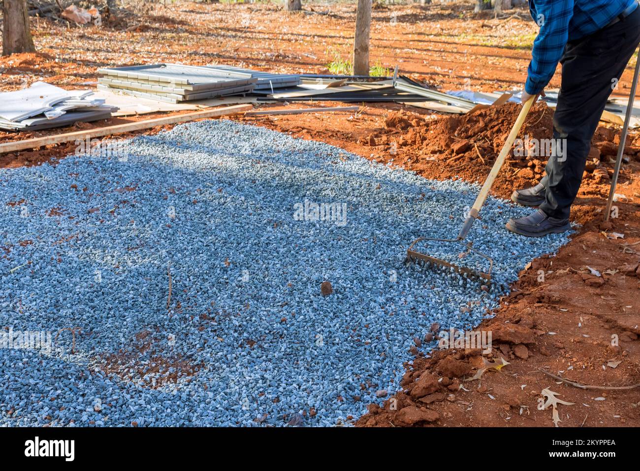 Creating level surface for gravel as deck foundation the shed in ...